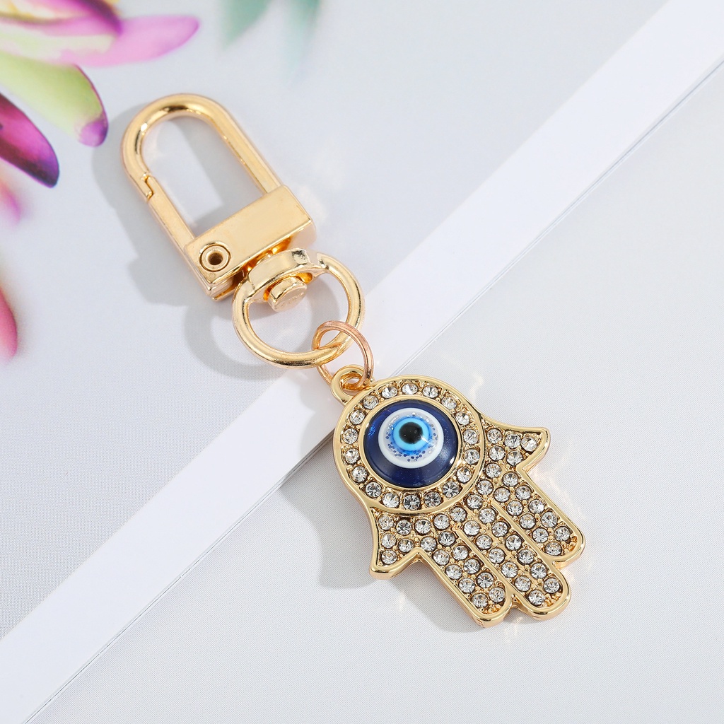 Evil Eye keychain hollow slanted eye palm blue eye bag lucky blessing ...