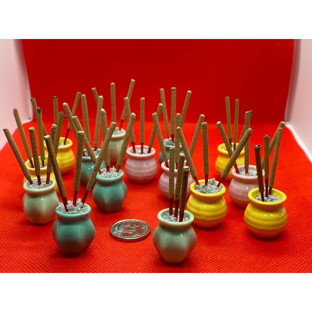Handmade Miniature incense stick in the incense burner, columbarium ...