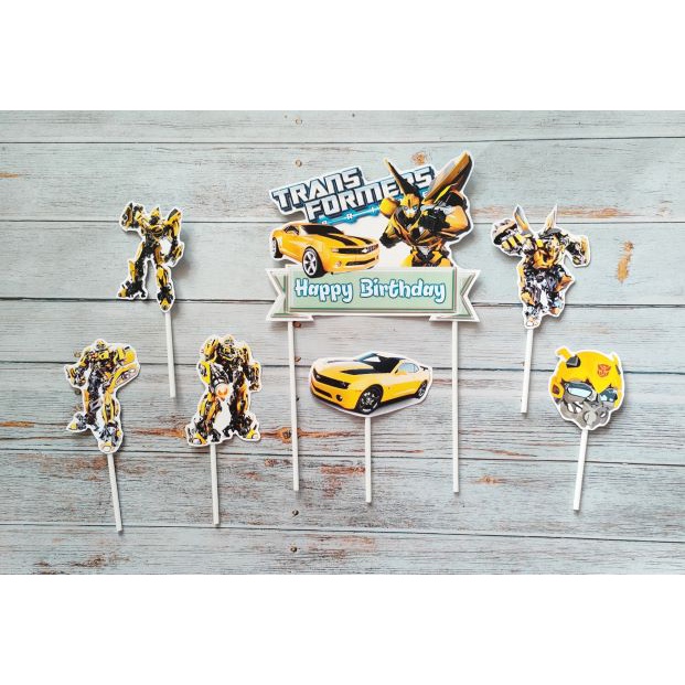 One set of birthday cake decorations, bumblebee bumble bee transformers ...