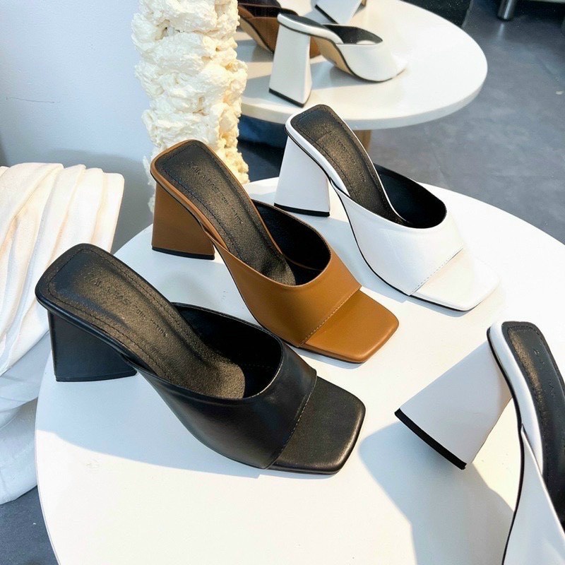 Smooth leather clogs with square toe and large triangle heel of the ...