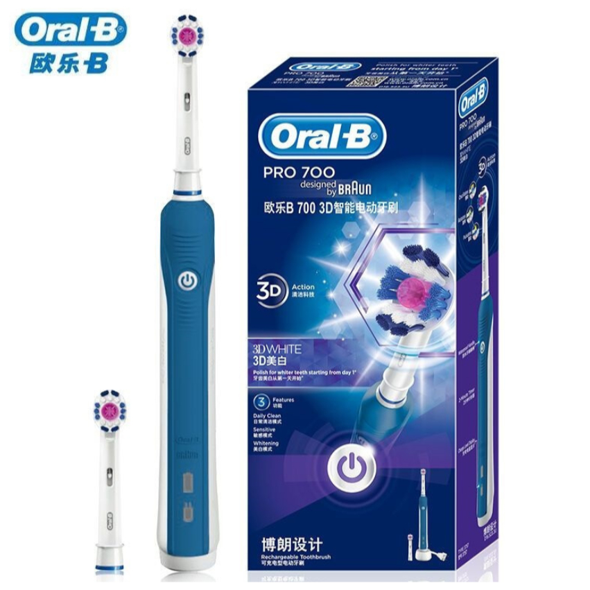 Oral B Pro 700 Electric Toothbrush Two brush heads with Sonic Rotating ...