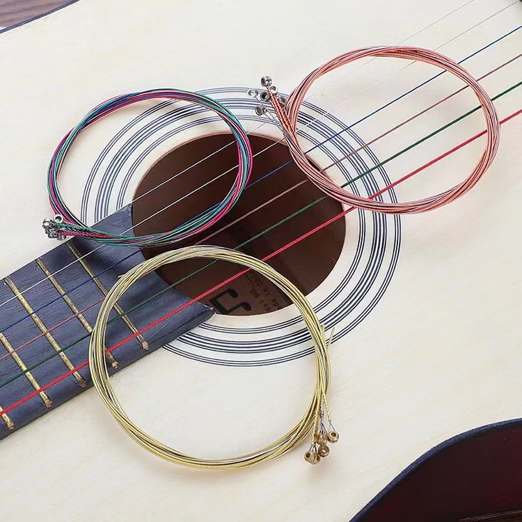Guitar strings folk music wooden guitar brass red copper color strings ...