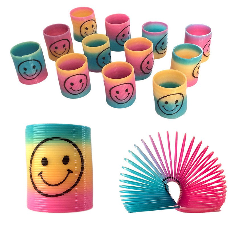 6 x Mini Slinky Smiley Face Springs Rainbow Smiley Face Spring Party ...