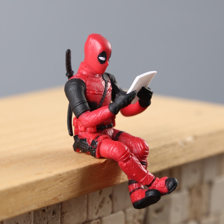 Spot The Avengers Mini Figurine Deadpool Sitting Posture Reading Book ...