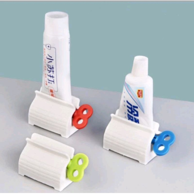 Manual Rotating Toothpaste Dispenser Roller Squeezer Roll Holder ...