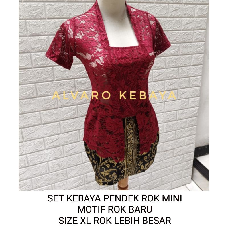 Soft brocade kebaya suit with short sleeves, mini span skirt above the ...
