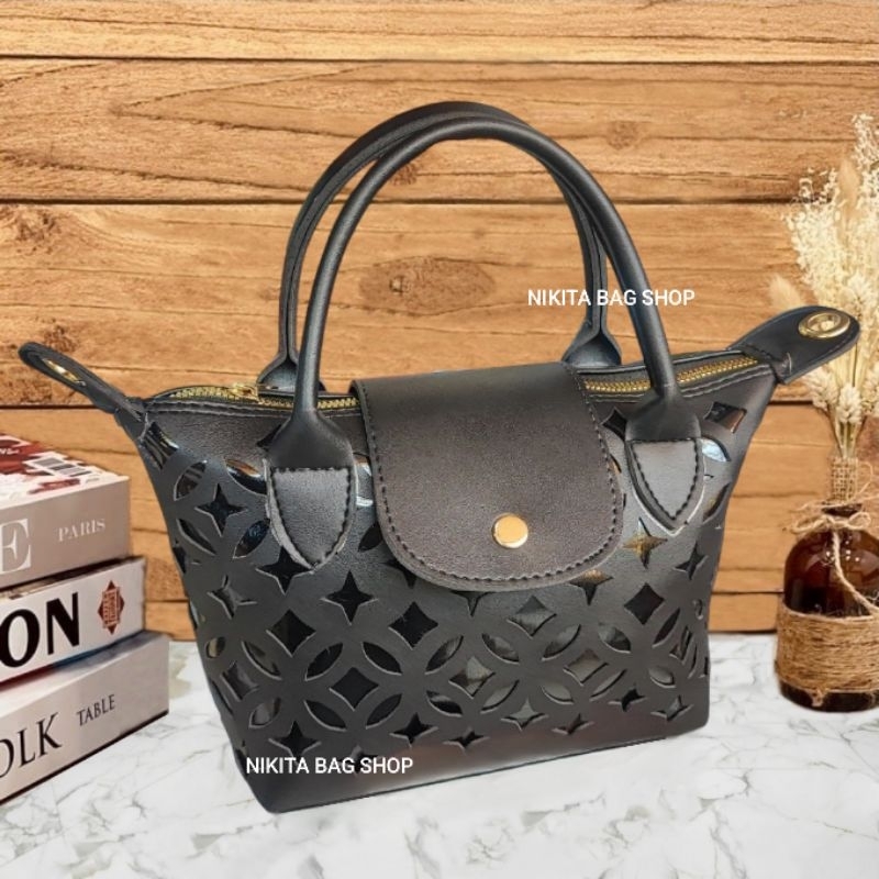 NIKITA - Latest women's Bag 2025 trendy viral / Top Handle Bag (mini ...