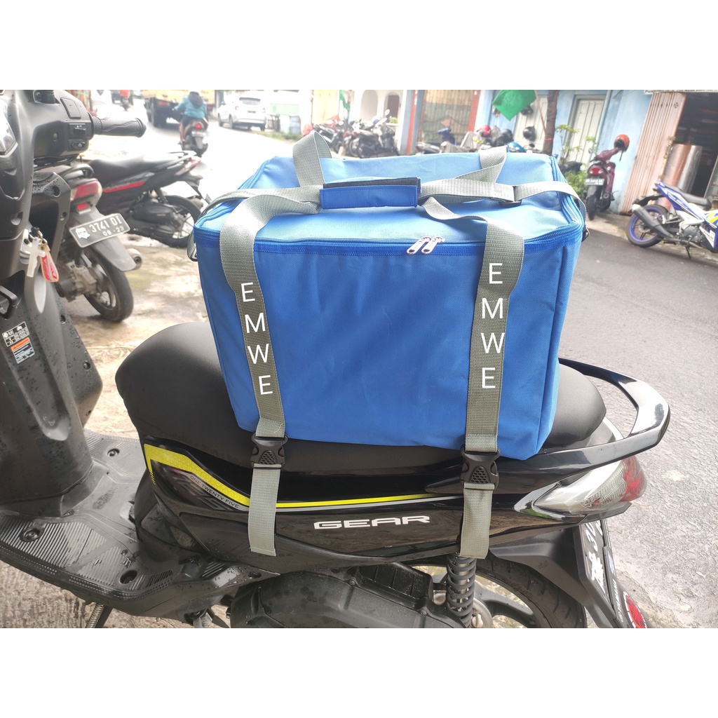 3 in 1 Delivery Bag Courier Bag tied on the rear saddle seat on a ...