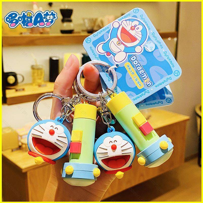 YYDS Doraemon Creative flashlight keychain cartoon car backpack pendant ...