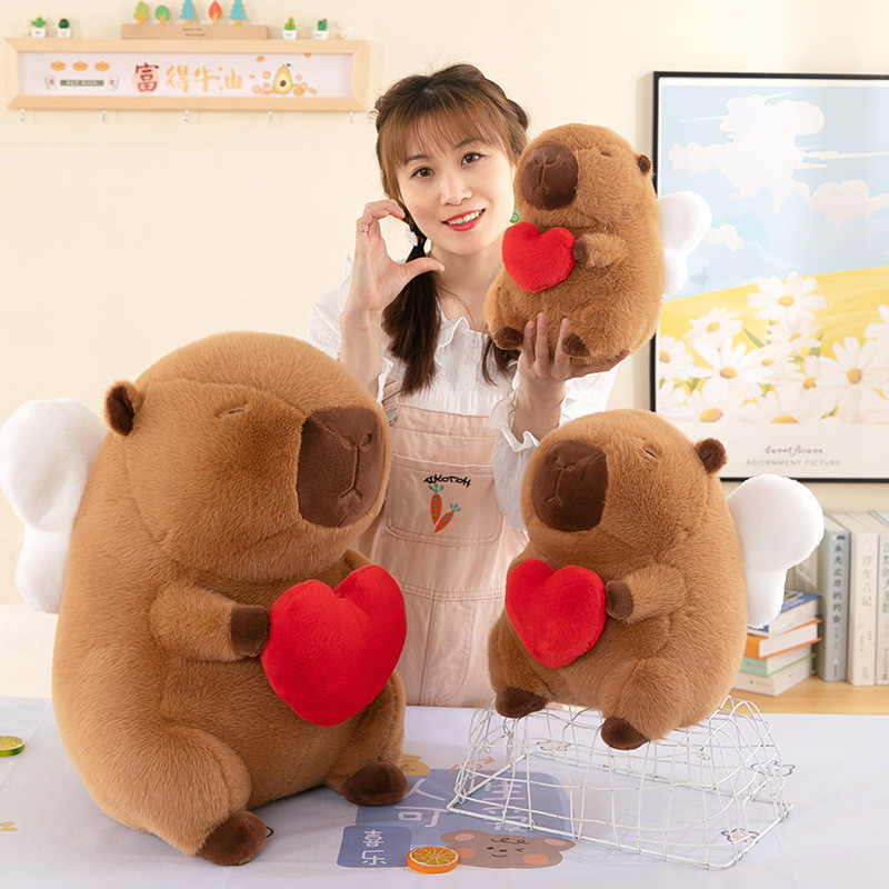 Cute Capybara plushie Angel wings holding heart capybara plush toy doll ...