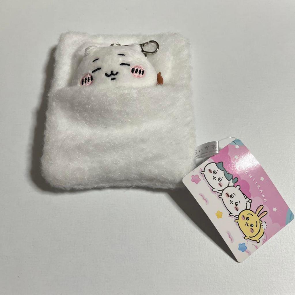 This is a Chiikawaka Ofuton Reel Pass Case, a prize exclusively for ...