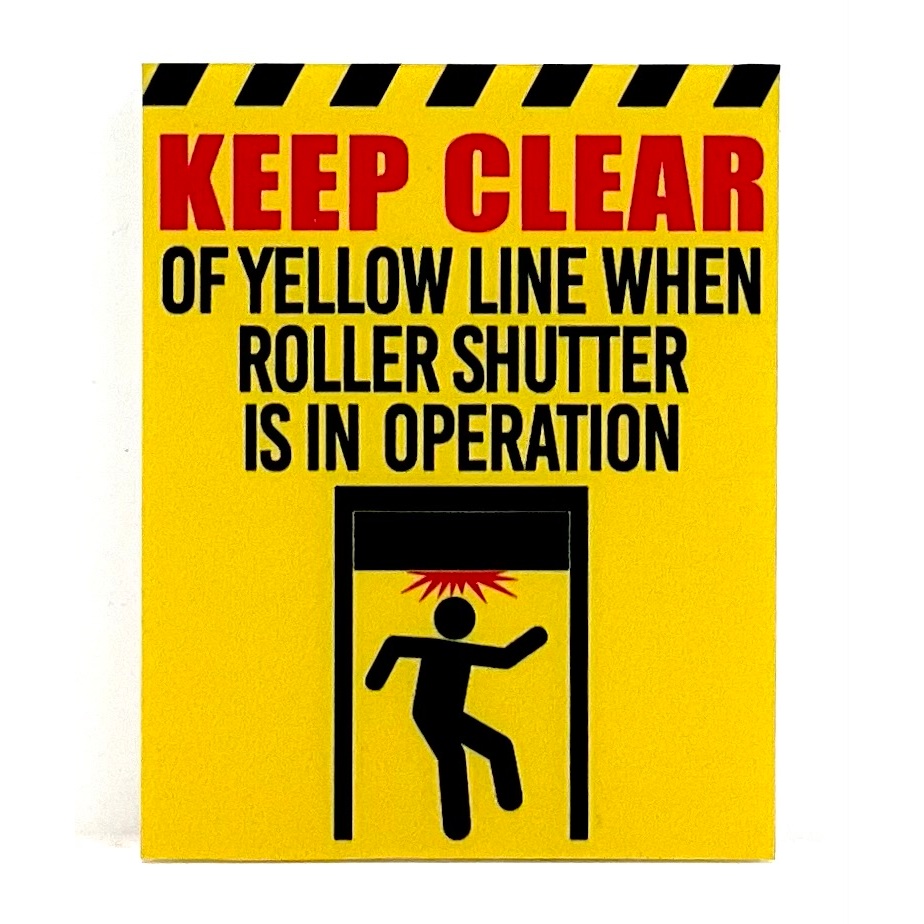 KEEP CLEAR OF YELLOW LINE WHEN ROLLER SHUTTER IS IN OPERATION SIGN ...