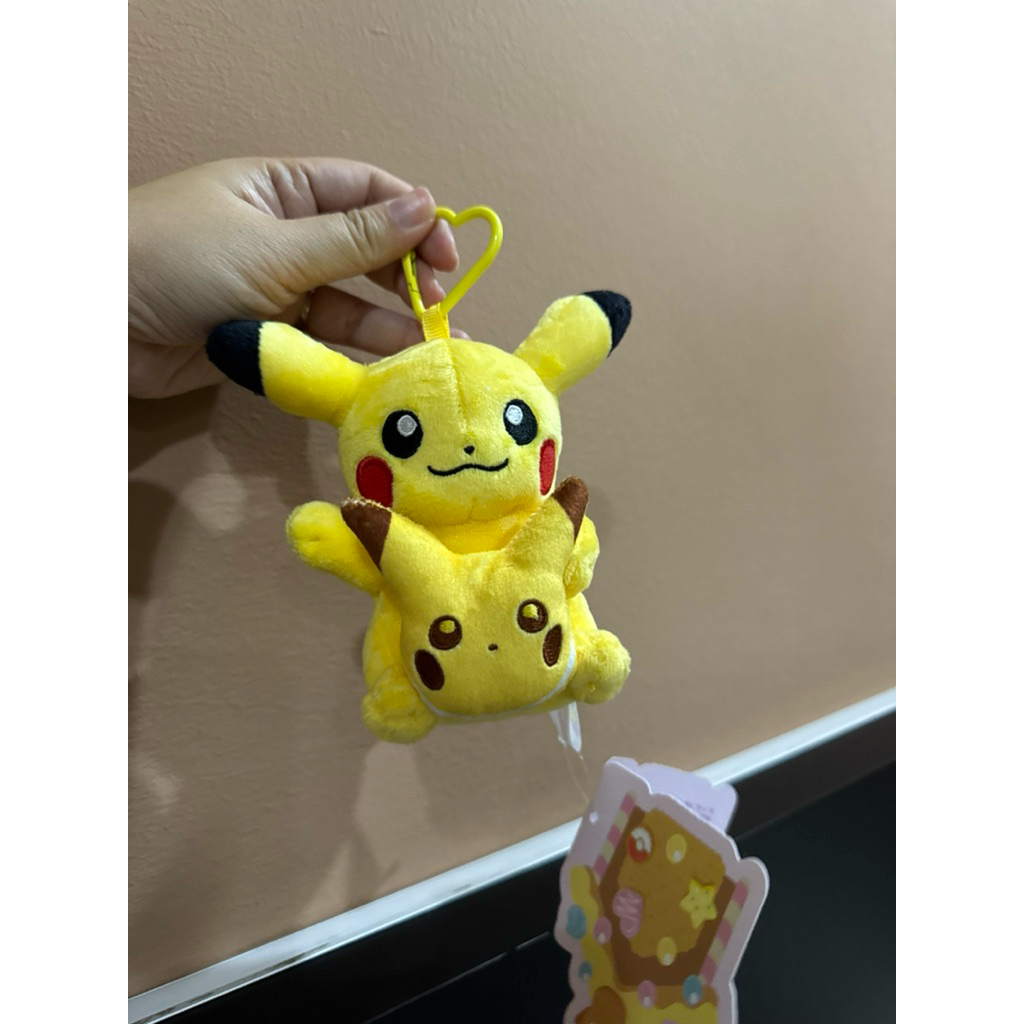 Pokemon centre exclusive launch - pikachu holding pikachu head keychain ...