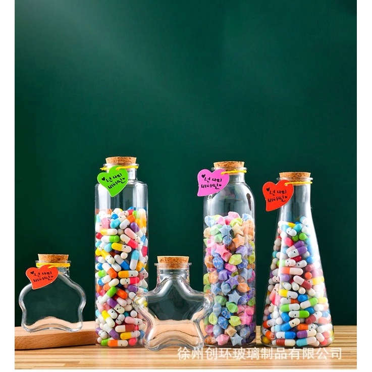 Plastic jars for star-folded paper, star-folded paper, bottles for milk ...