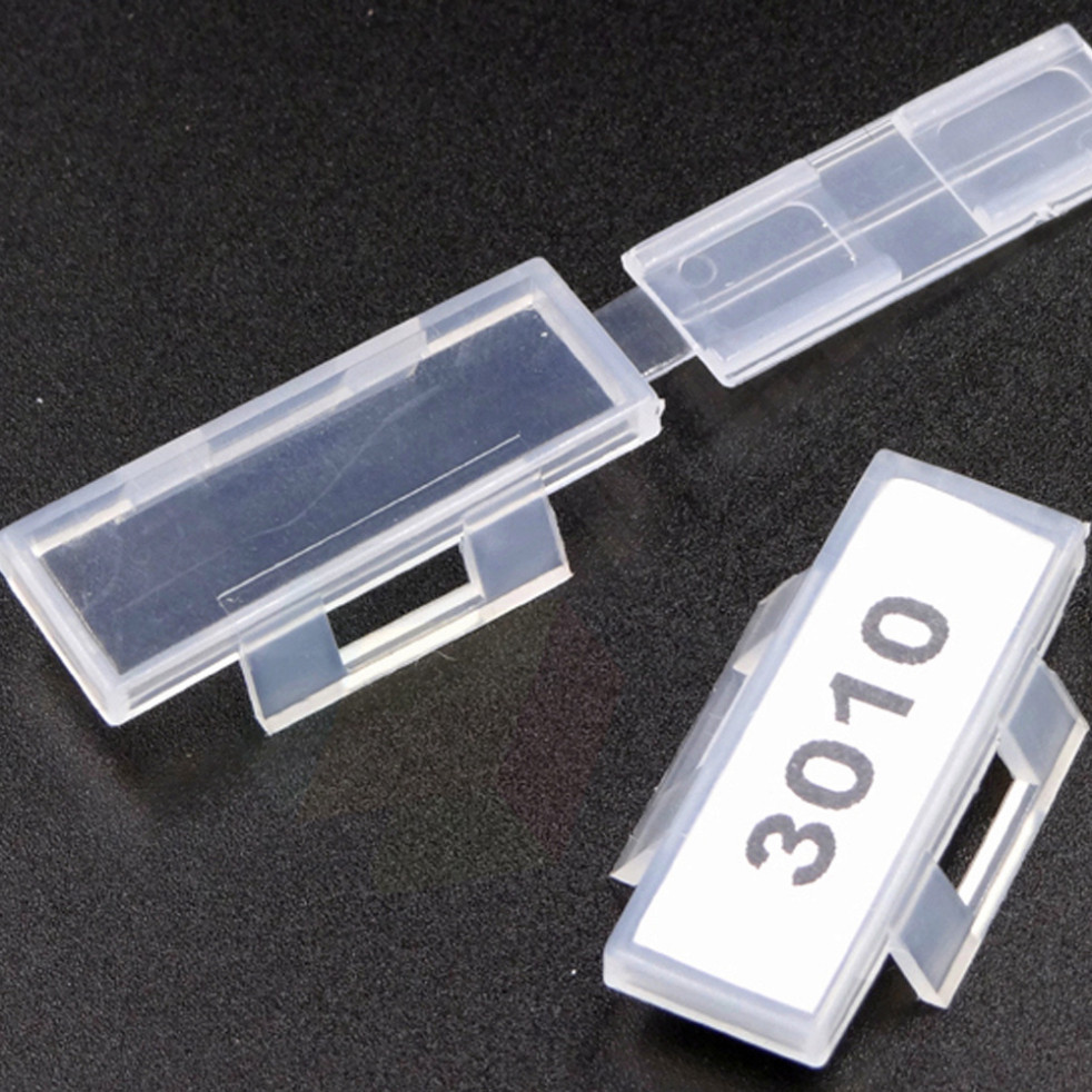 The Clear Plastic box Contains The Power Cable label box name tag ...