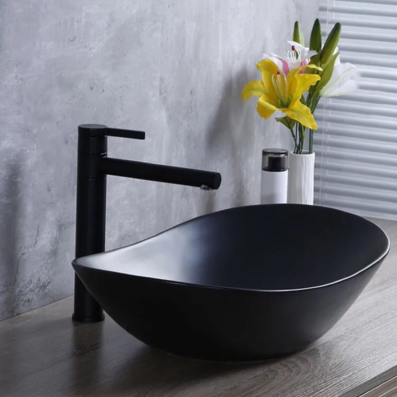 Oval tabletop wash basin, black boat-shaped wash basin, bright white ...