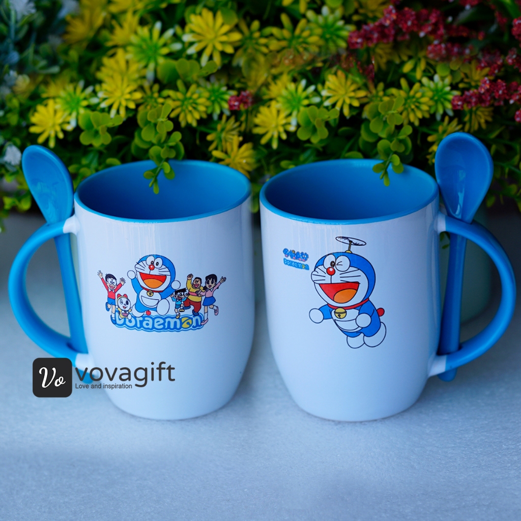 Blue ceramic cup with cute dented base printed with Doremon image, cute ...