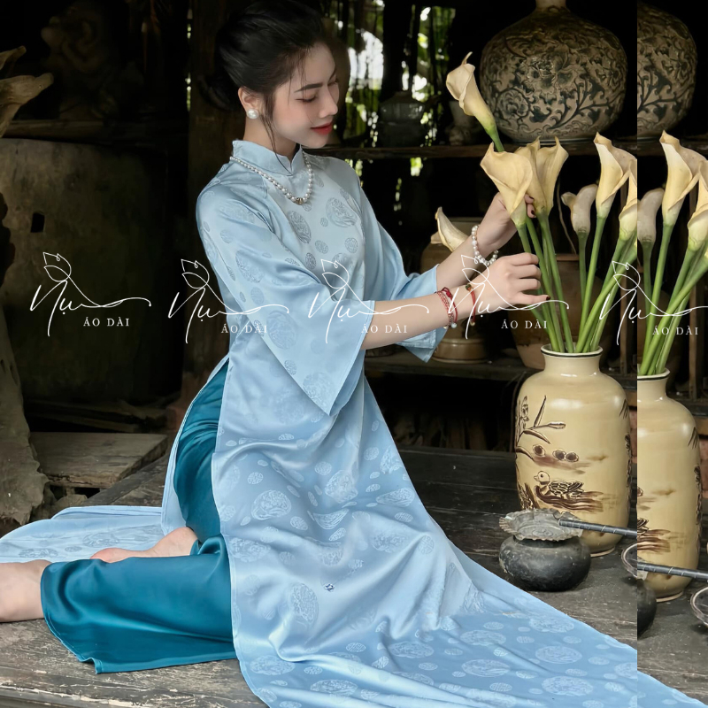 Innovative Bich Ly ao dai for women with silk brocade and the word Tho ...