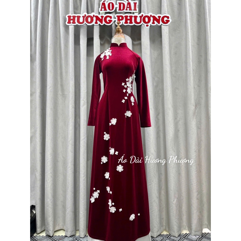 Traditional Huong Phuong Ao Dai in soft Snow Velvet fabric with white flower embellishments for ...