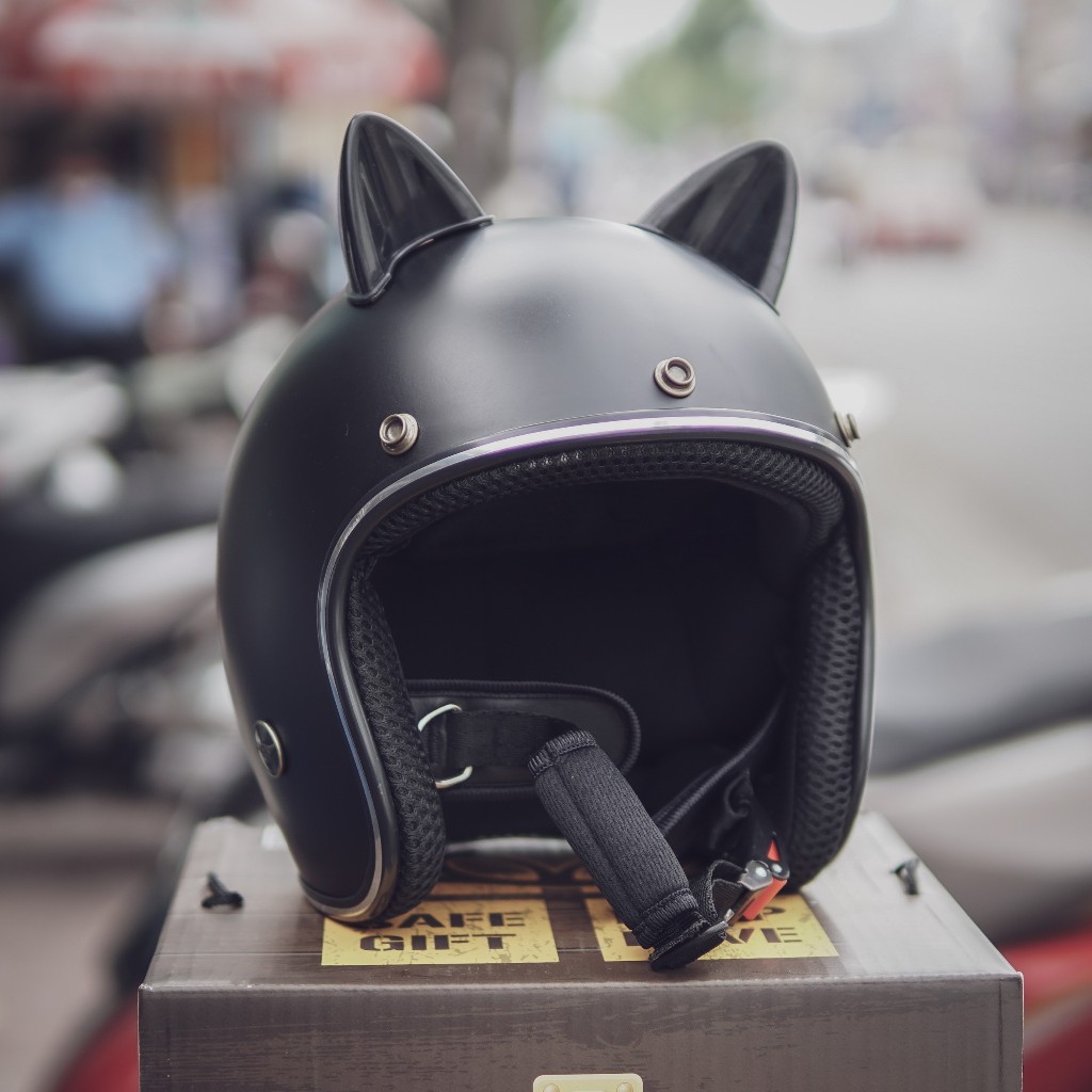 Very cute 3/4 black helmet with black lining and short plastic cat ears ...