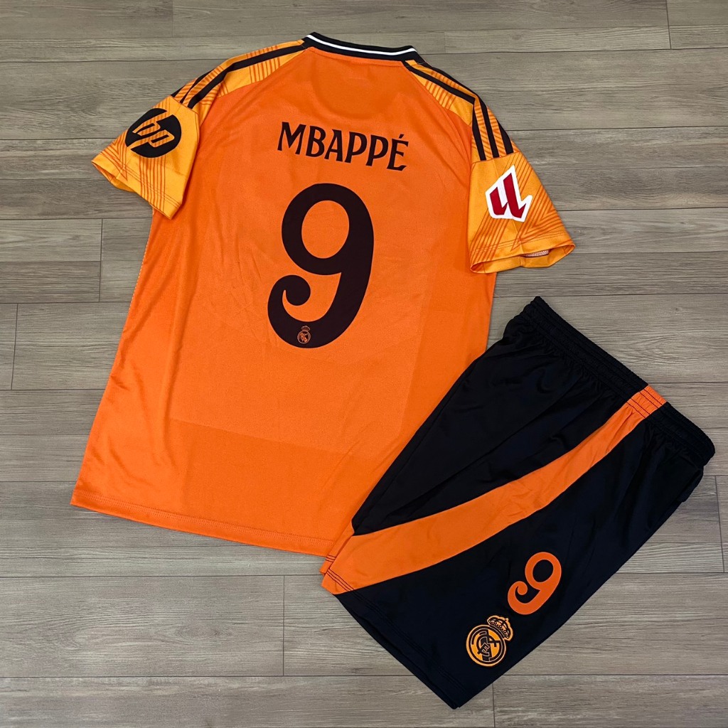 Real orange away kit 2025 with Mbappe's name printed on number 9 ...