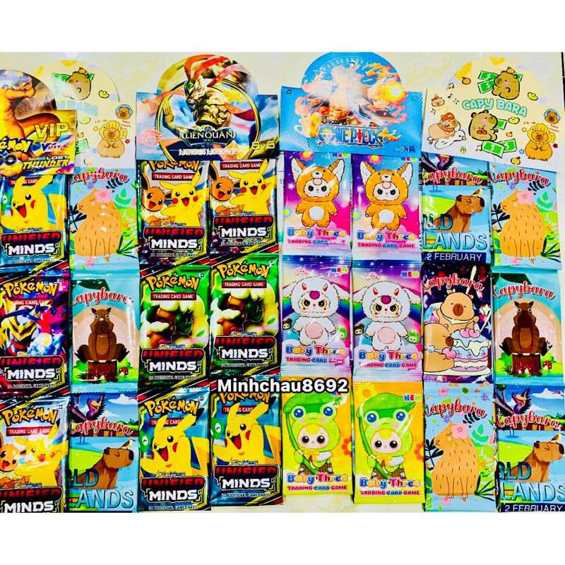 Paper cards with pictures of Natra, baby three, capybara, labubu ...