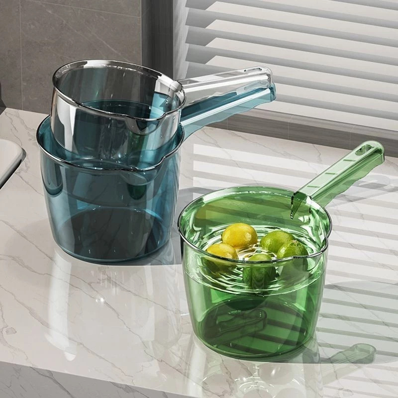 Clear plastic water ladle with long, colorful handle. water ladle ...