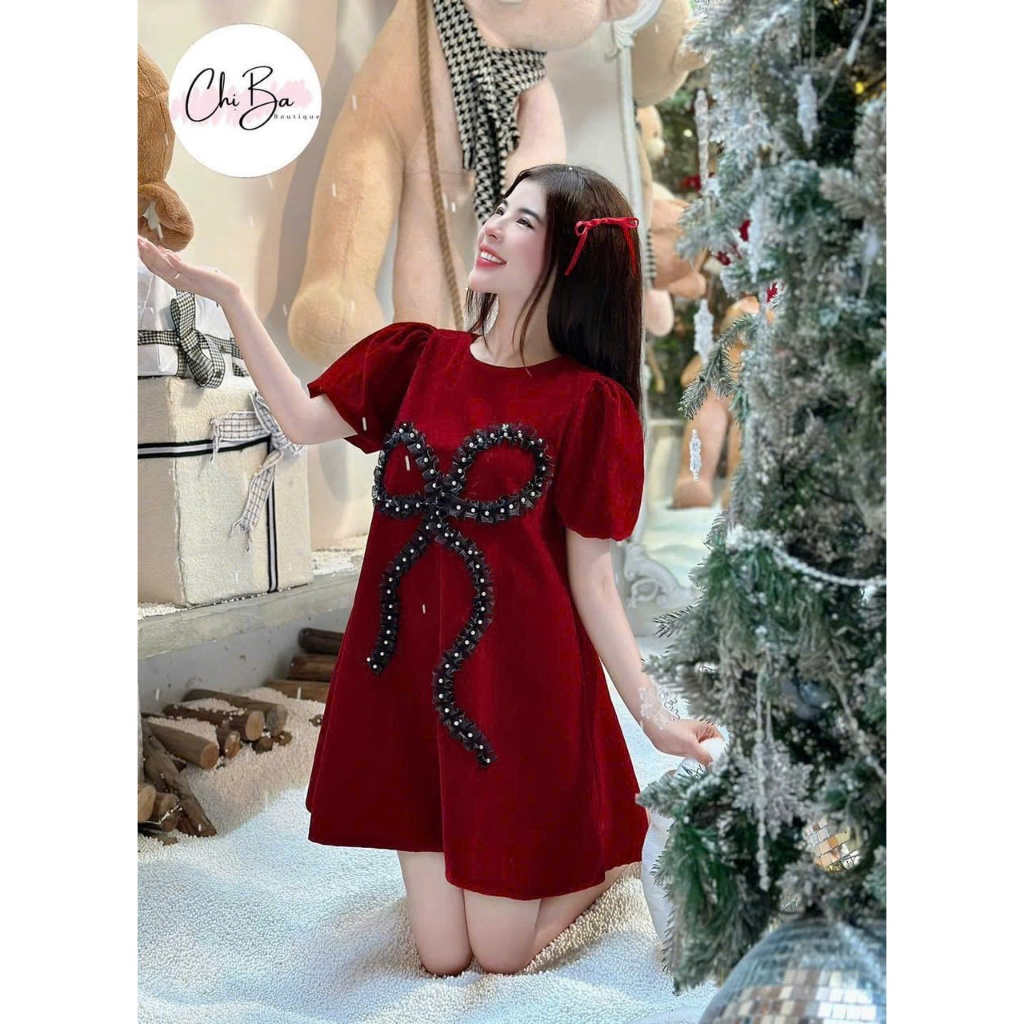 Dress designed in velvet with babydoll shape and a cute ruffle bow with ...