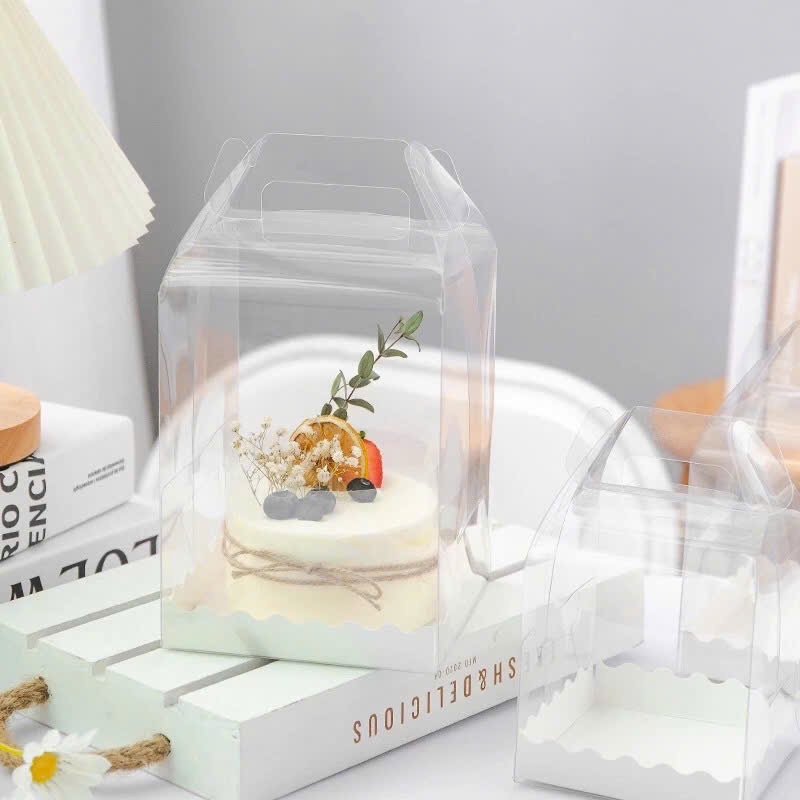 Transparent mica box with lace-lined handle for birthday cake ...