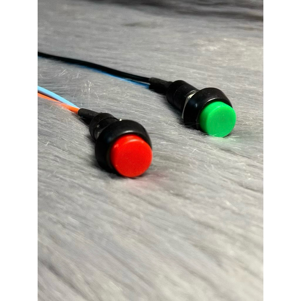 Small round on/off and passing switch button (on/off and release ...