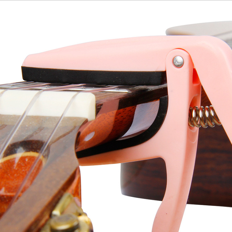 Ukulele clip Capo of various colors (with pick included) | Shopee Singapore